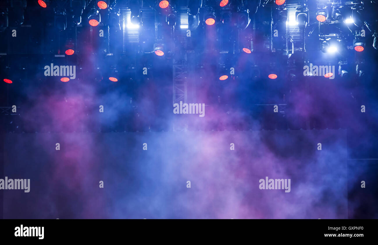 Stage lights and colorful smoke on electric concert Stock Photo - Alamy