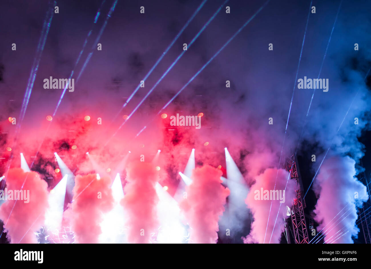 Stage lights and colorful smoke on electric concert Stock Photo - Alamy