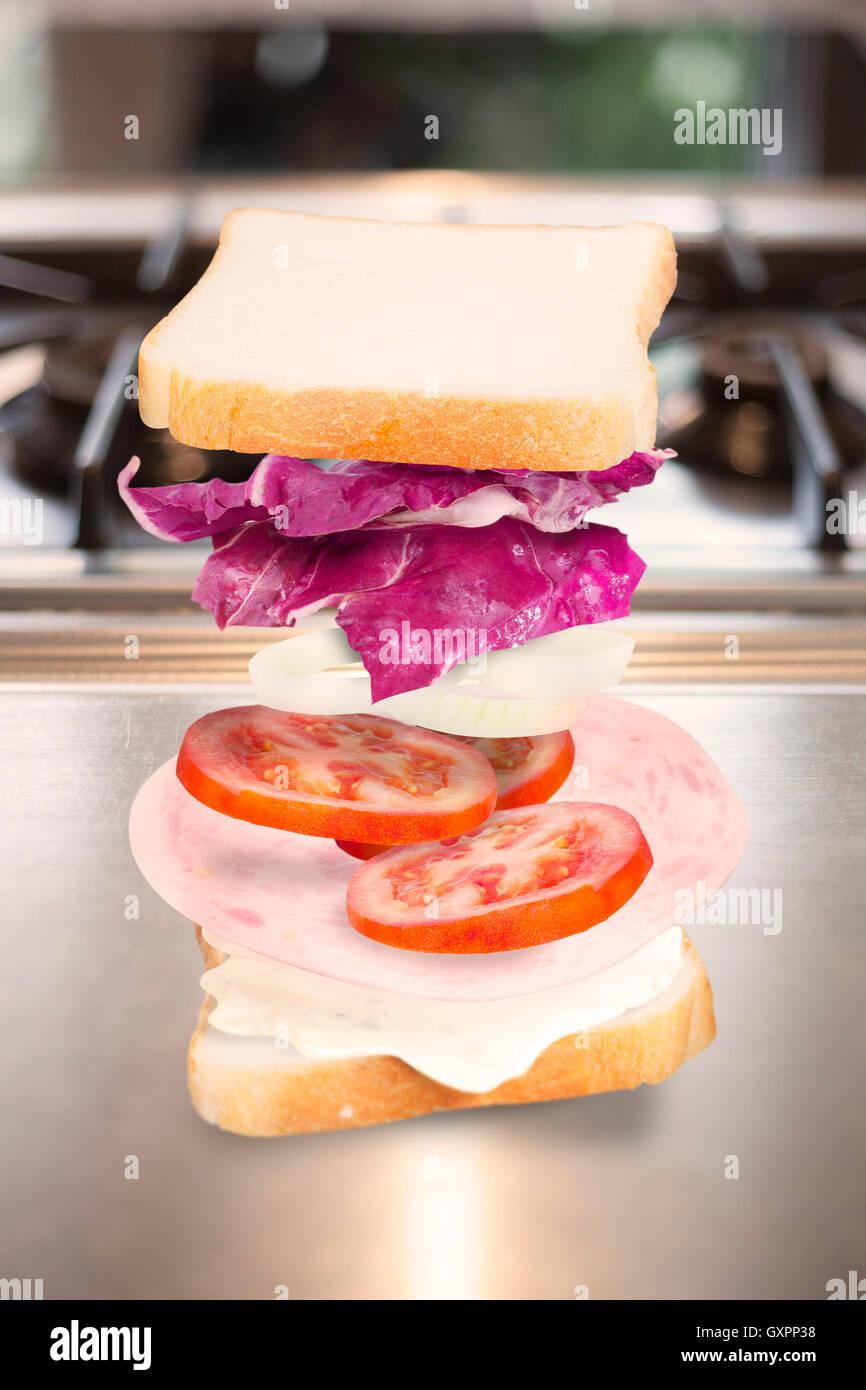 Ham sandwich with ingredients floating Stock Photo - Alamy