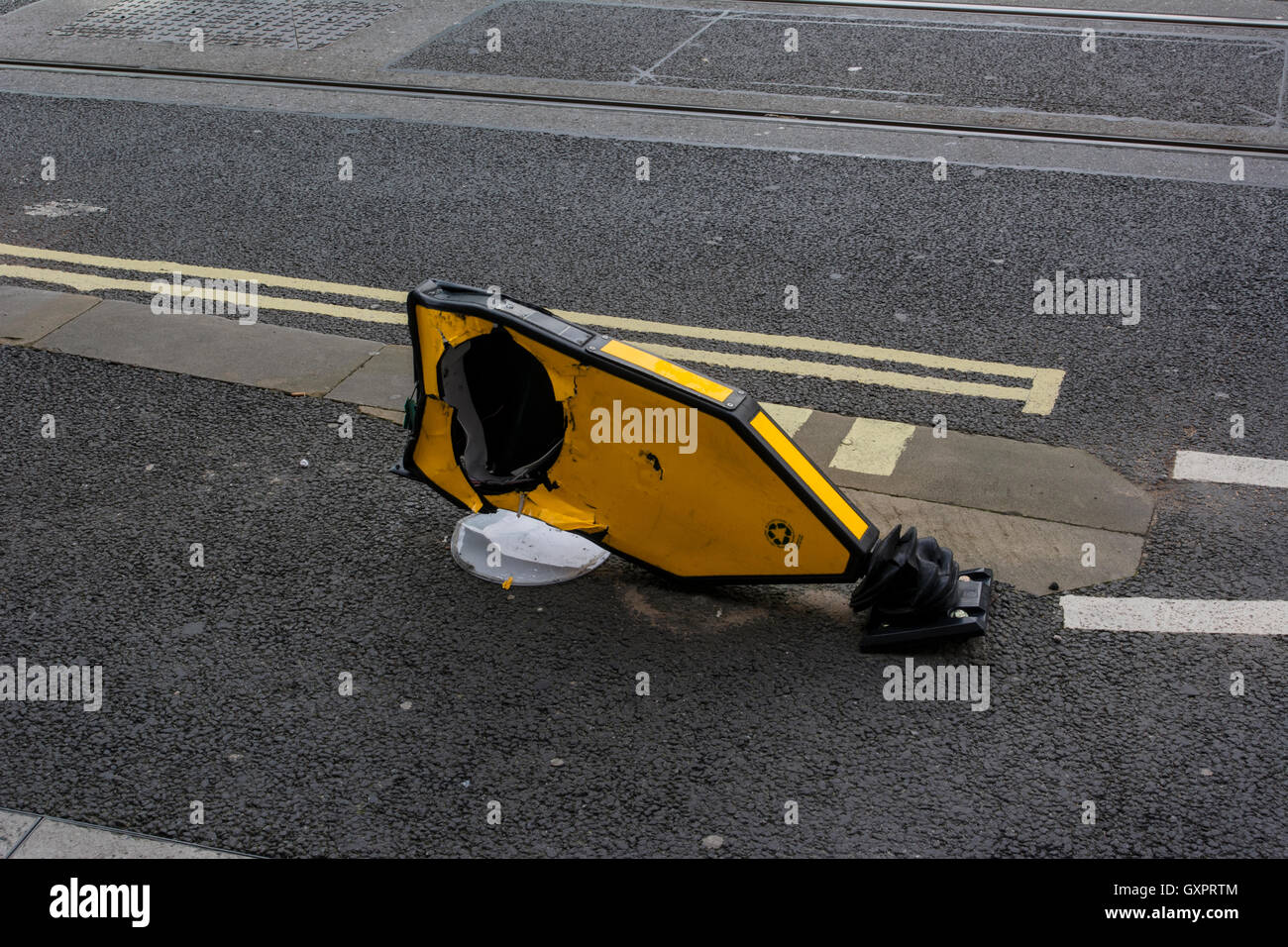 Damaged bollard in the road Stock Photo - Alamy
