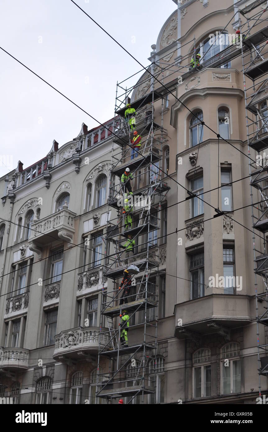 People working together build building hi-res stock photography and ...