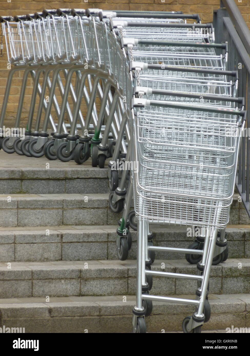 Shopping trolleys down steps Stock Photo - Alamy
