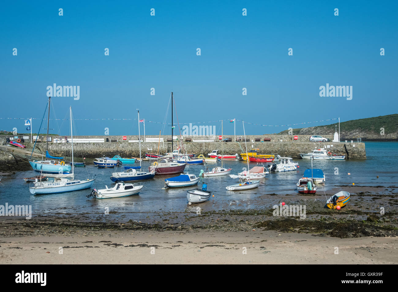 Anglesey, Wales. Pleasure boats at Cemaes bay harbour Stock Photo - Alamy
