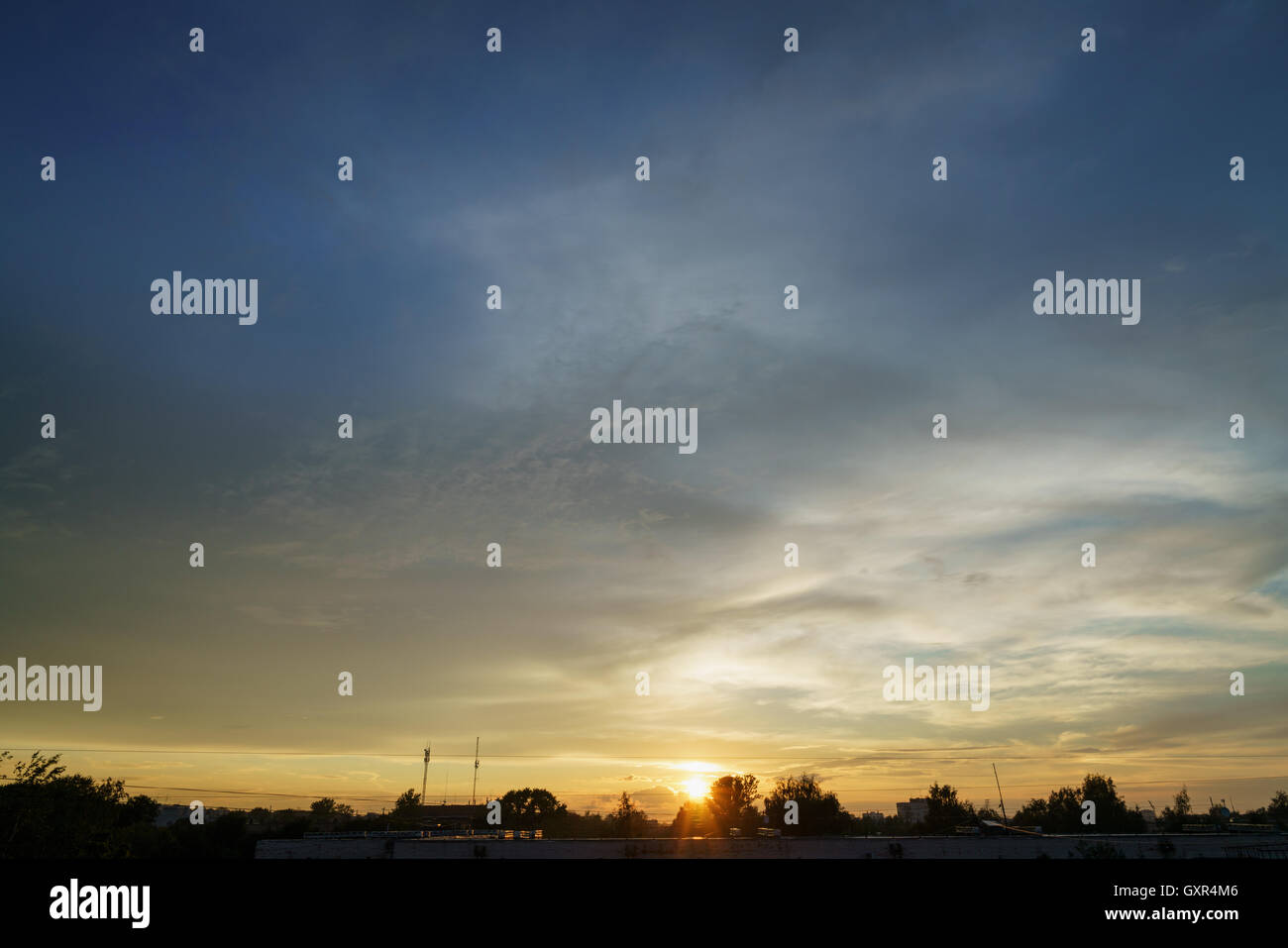 Cloudy sky sunset with street light hi-res stock photography and images ...