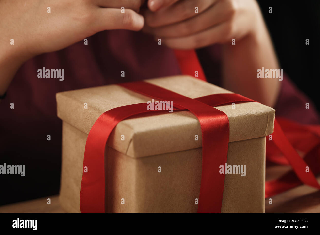 Close up female hand packing hi-res stock photography and images - Alamy