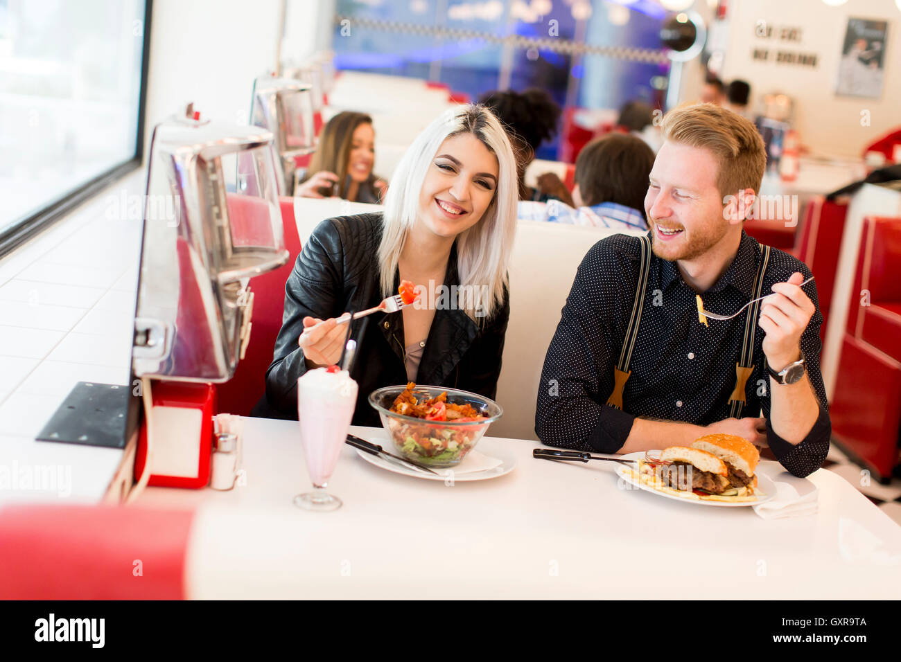 View of the people meeting in the diner Stock Photo - Alamy