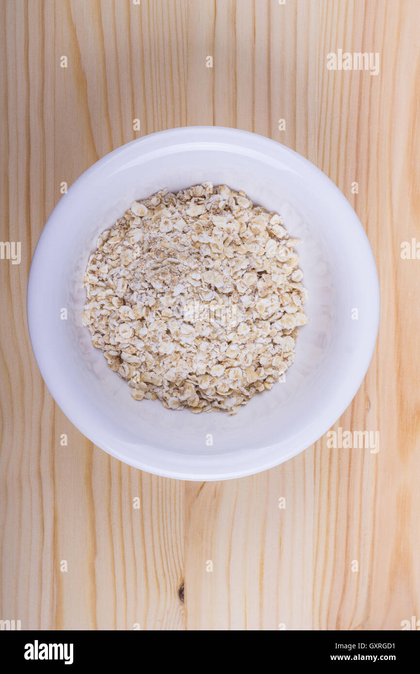 Bowl full of oats ready to be served for breakfast Stock Photo - Alamy