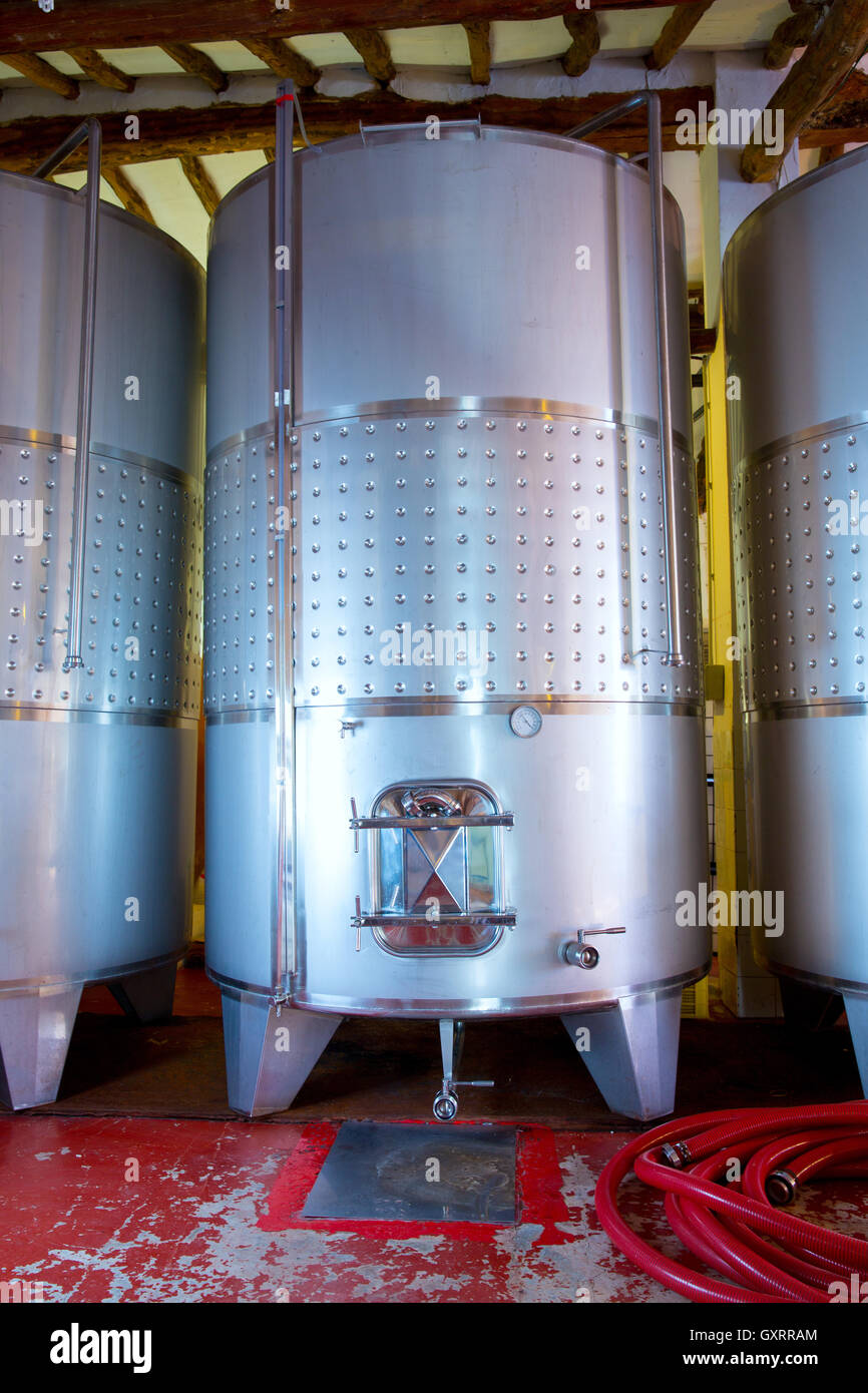 Stainless steel fermentation tanks vessels in winery Stock Photo - Alamy