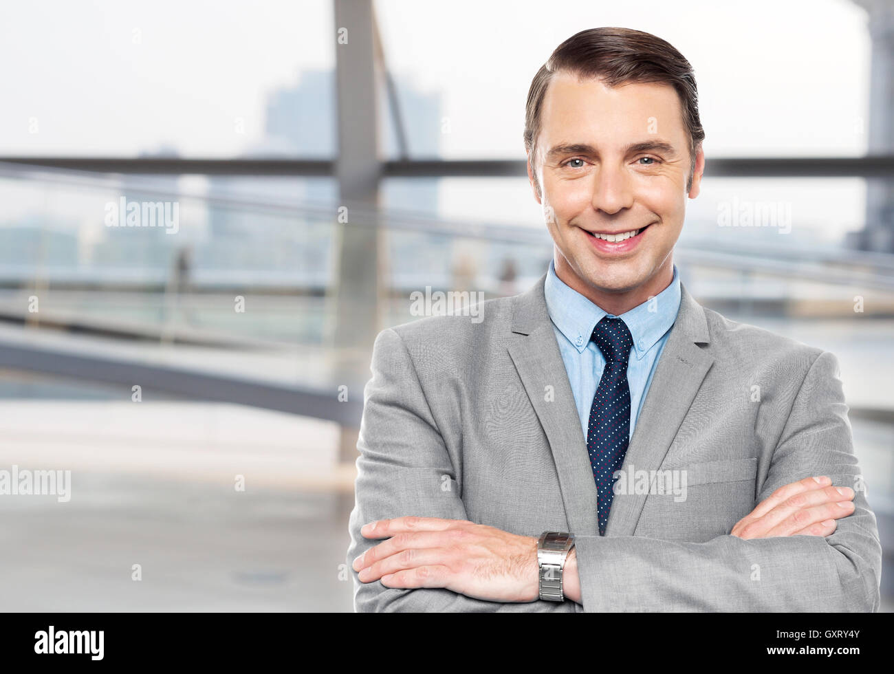 Handsome confident business executive Stock Photo - Alamy