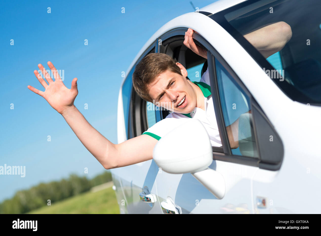 man stuck his hand out of the window Stock Photo - Alamy