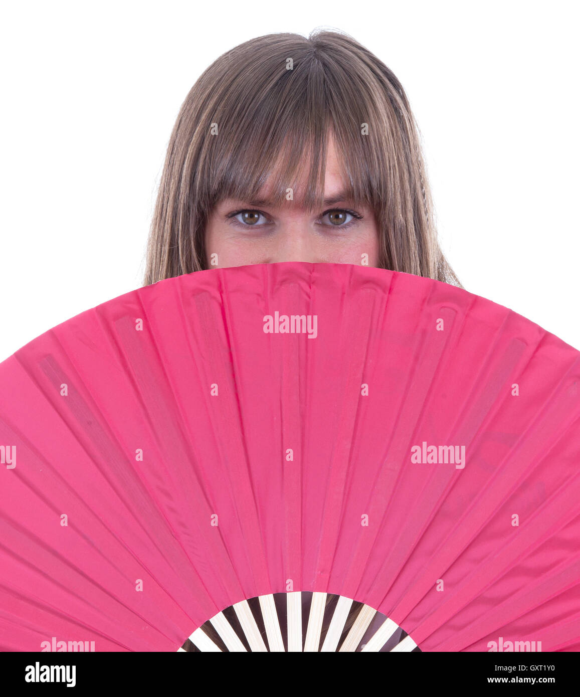 Studio portrait of a womans face partly hidden by a fan Stock Photo - Alamy