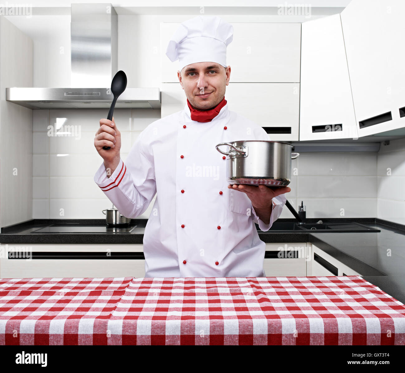 Male chef at kitchen Stock Photo - Alamy