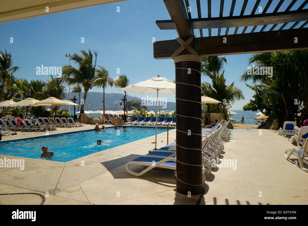 Swimming pool at resort hotel in Acapulco, Mexico Stock Photo - Alamy