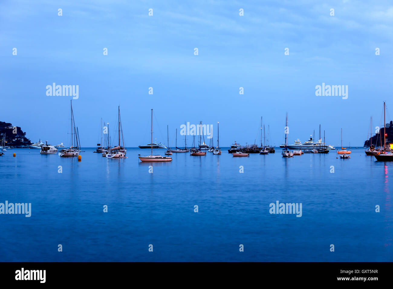 Evening view of boats in Villefranche sur mer in the French Riviera ...