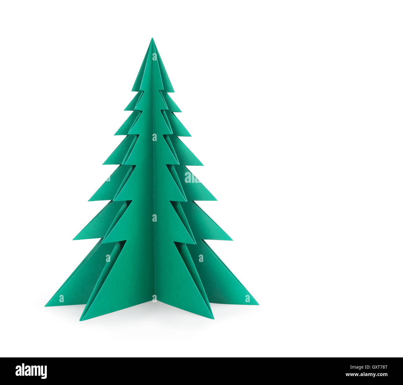 Green paper tree on a white background. Clipping patch Stock Photo - Alamy