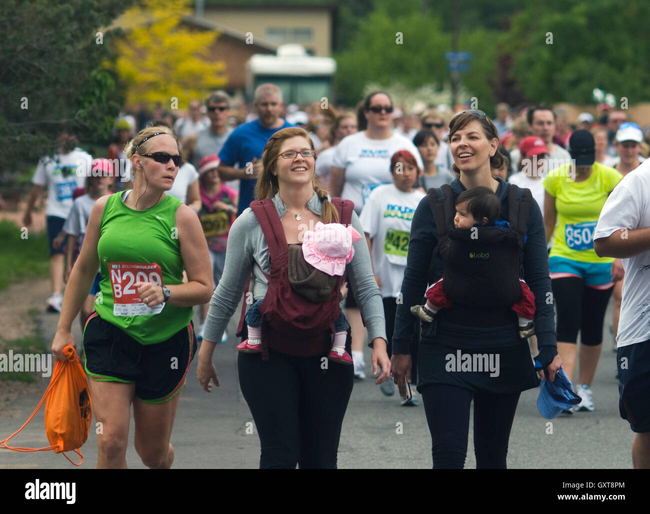 Two new mothers walk the Bolder Boulder with their newborn babies ...