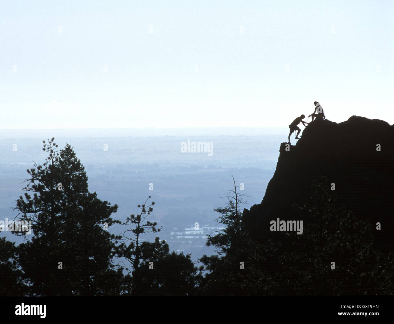 Climbers reaching summit just west of Boulder CO Stock Photo - Alamy