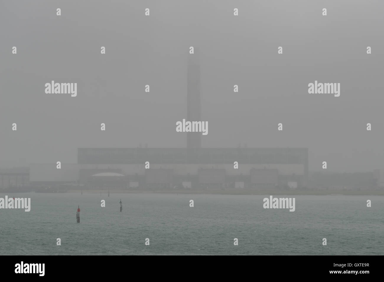 Frothy water on a beach Stock Photo - Alamy
