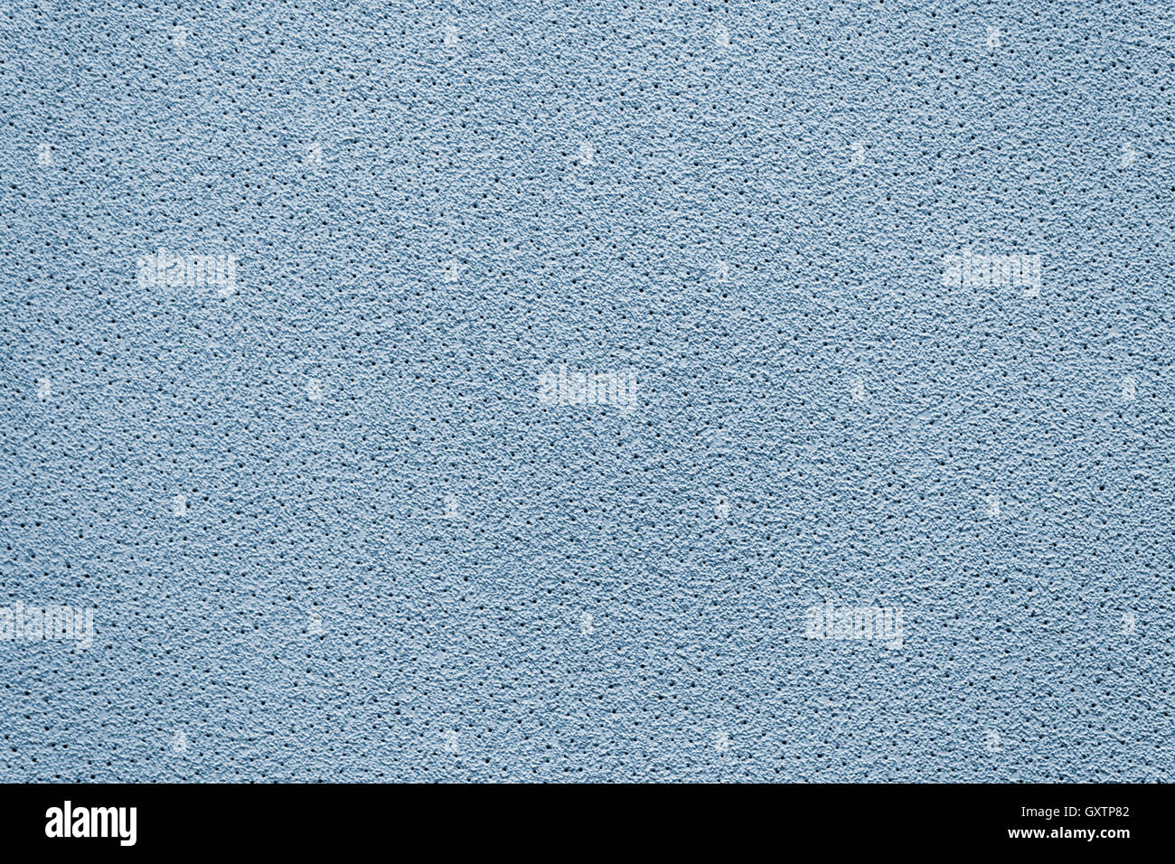 Stippled textured and perforated blue background Stock Photo - Alamy