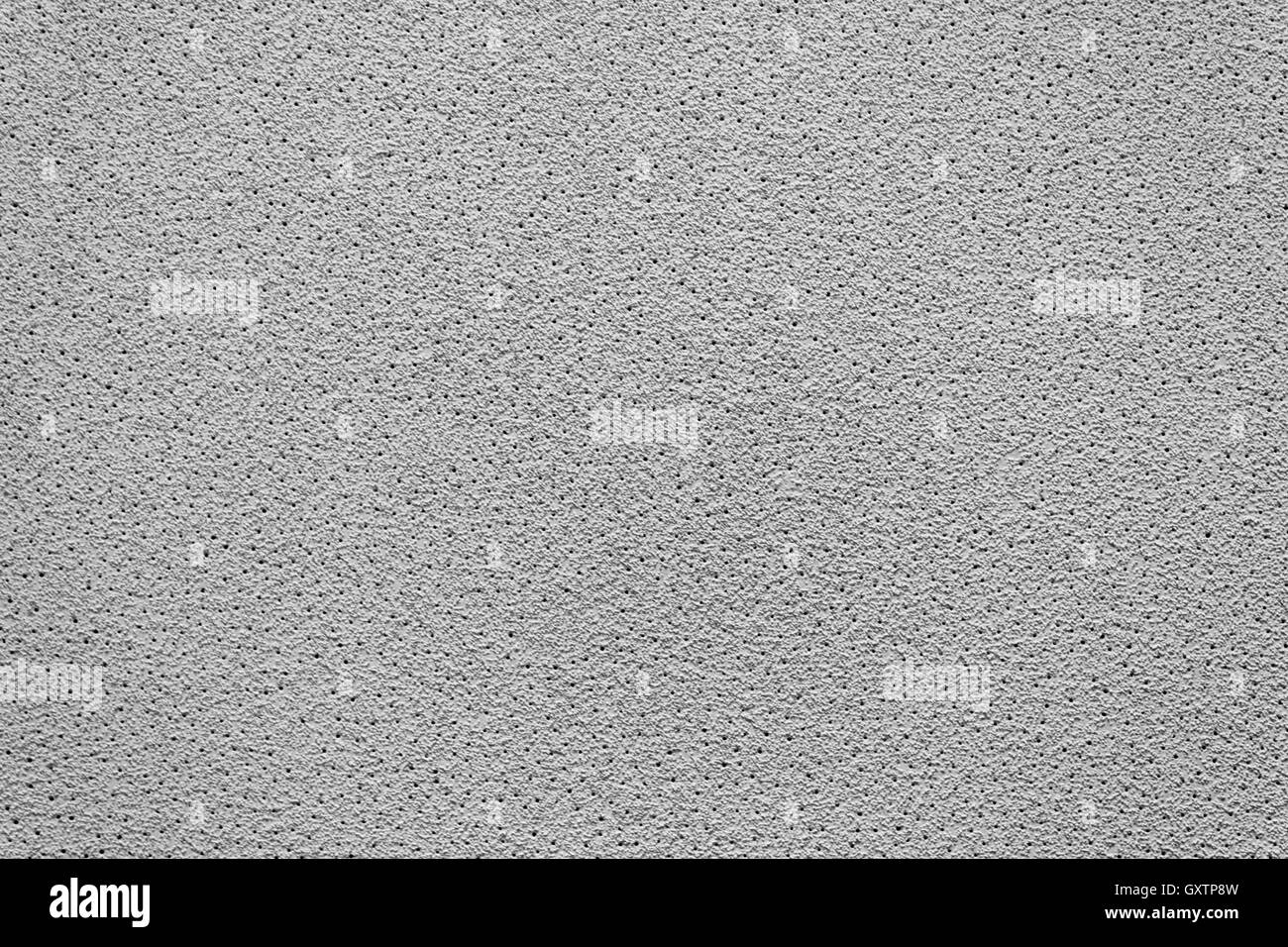 Stippled textured and perforated light grey background Stock Photo - Alamy