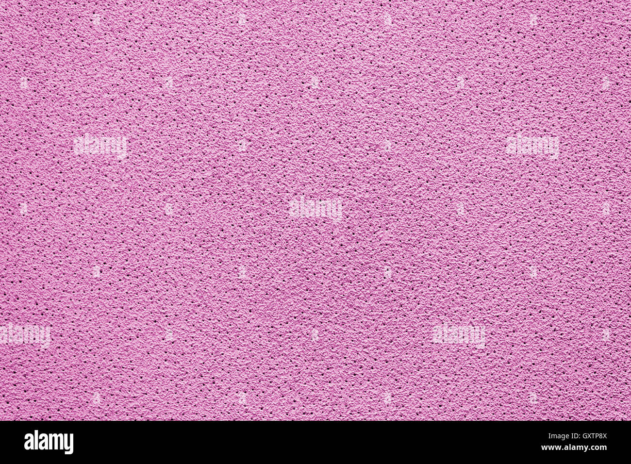 Stippled textured and perforated pink background Stock Photo - Alamy