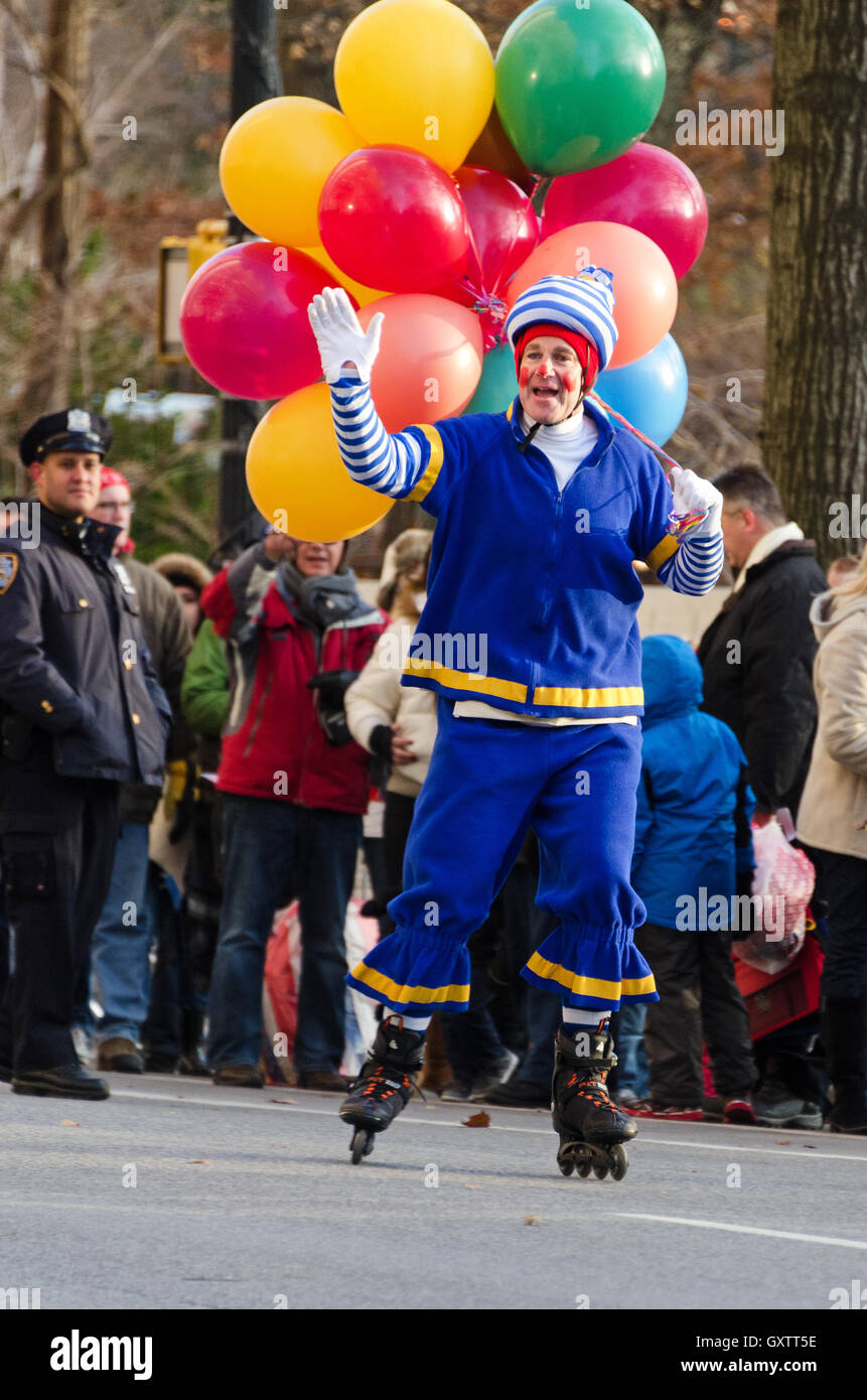 Rollerblading clowns entertain the waiting spectators before the Macy's ...