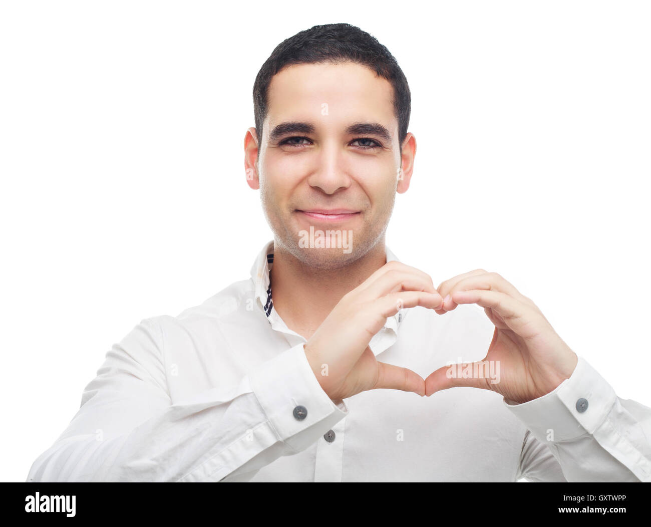 happy smiling young man showing a sign of a heart with his fingers ...
