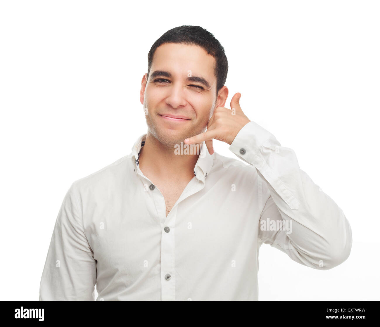 happy smiling young man showing a call me sign isolated against white ...