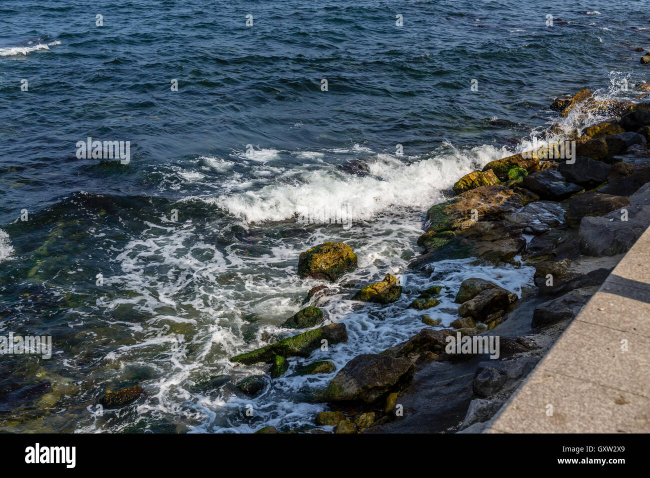 Wave hitting coast Stock Photo - Alamy