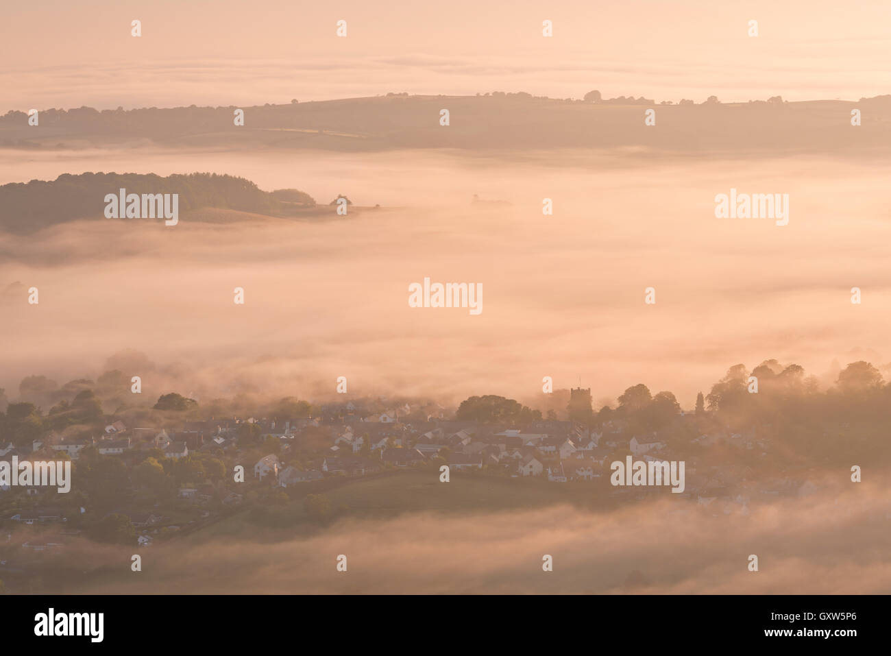Chagford Church and village surrounded by early morning mist, Dartmoor ...