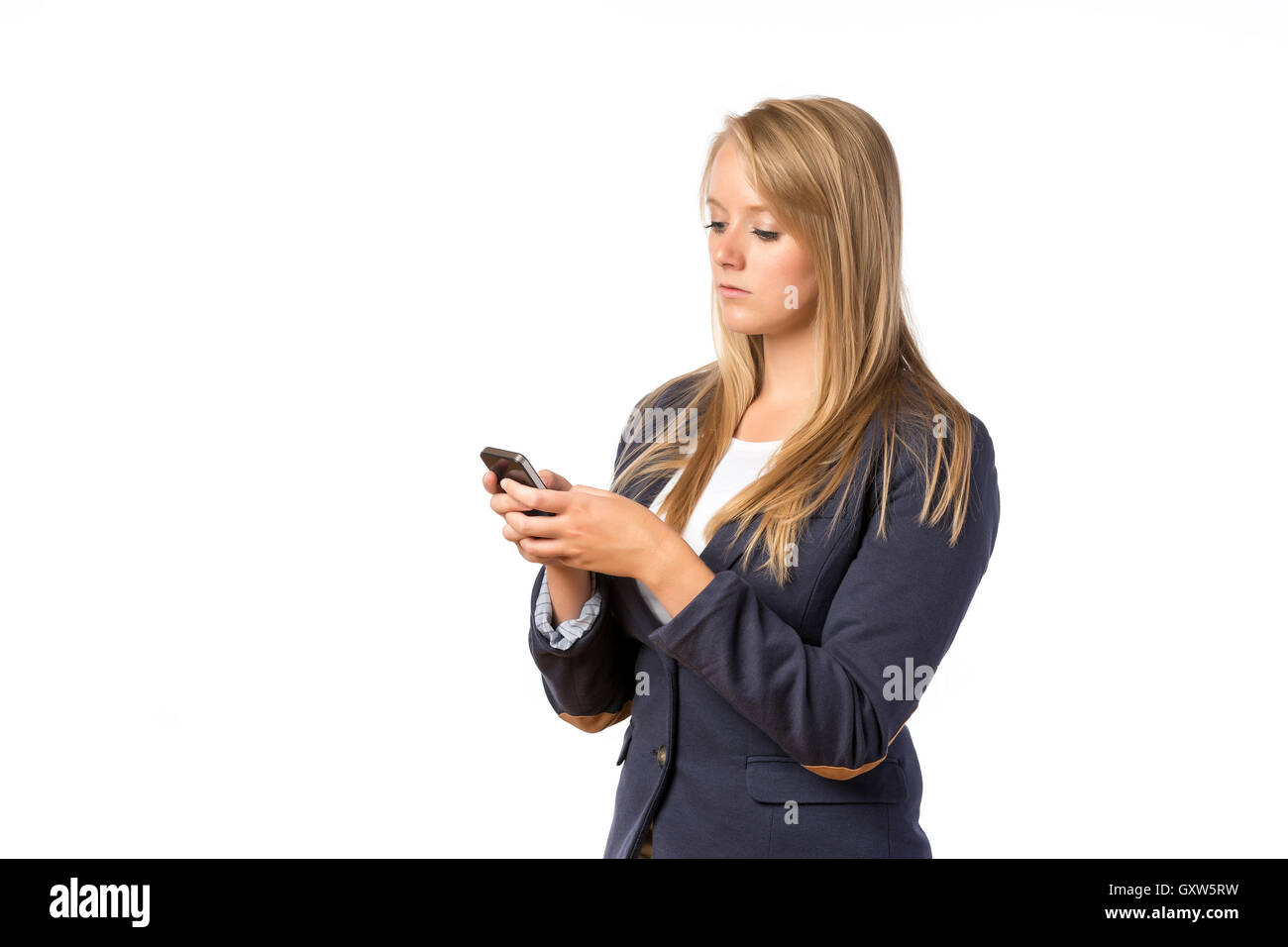 Blond Girl looking cellphone Stock Photo - Alamy