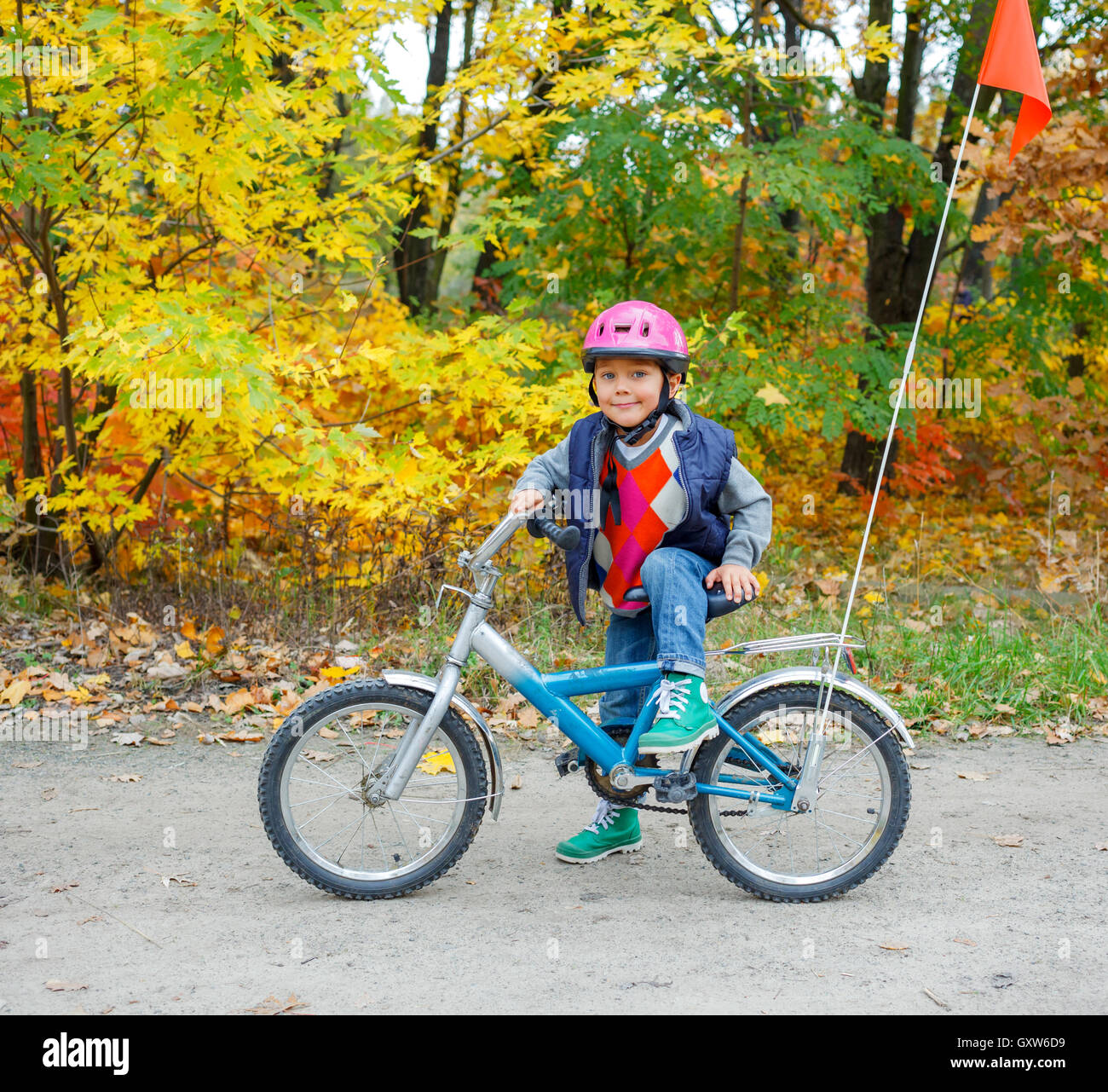 Little boy on bicycle Stock Photo - Alamy