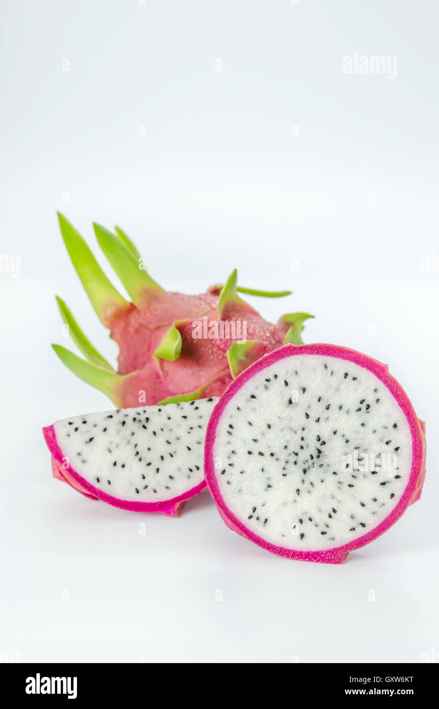 Ripe Dragon fruit or Pitaya with slice on white background Stock Photo ...