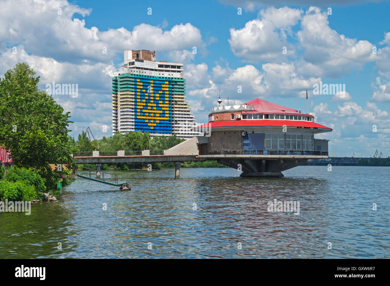 The disk-shaped house with red roof and the State Emblem of Ukraine ...
