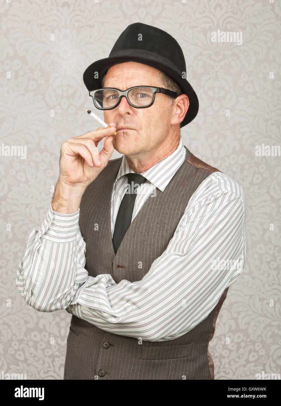 Skeptical Man Smoking Stock Photo - Alamy