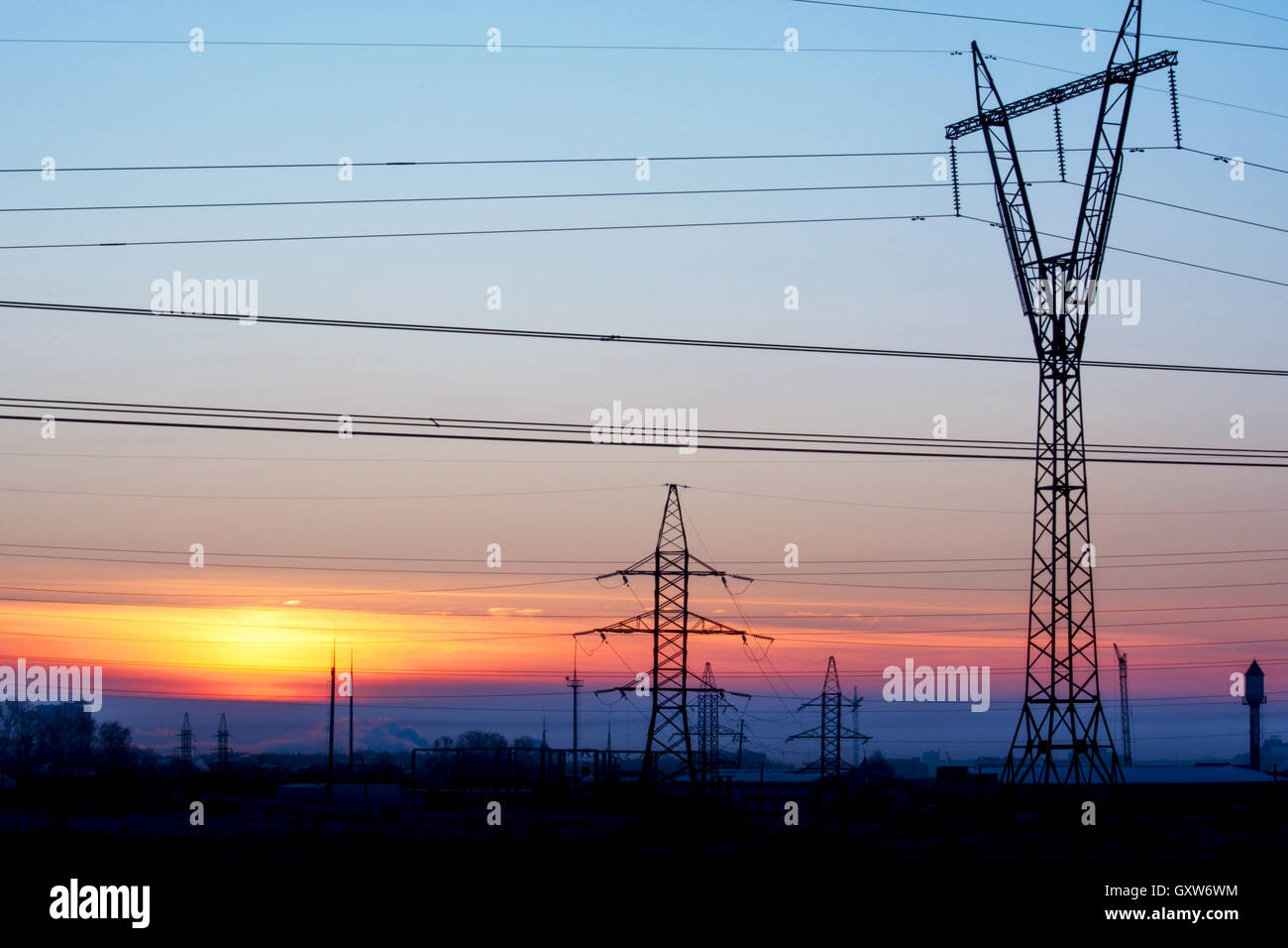 power lines in the sunrise Stock Photo - Alamy
