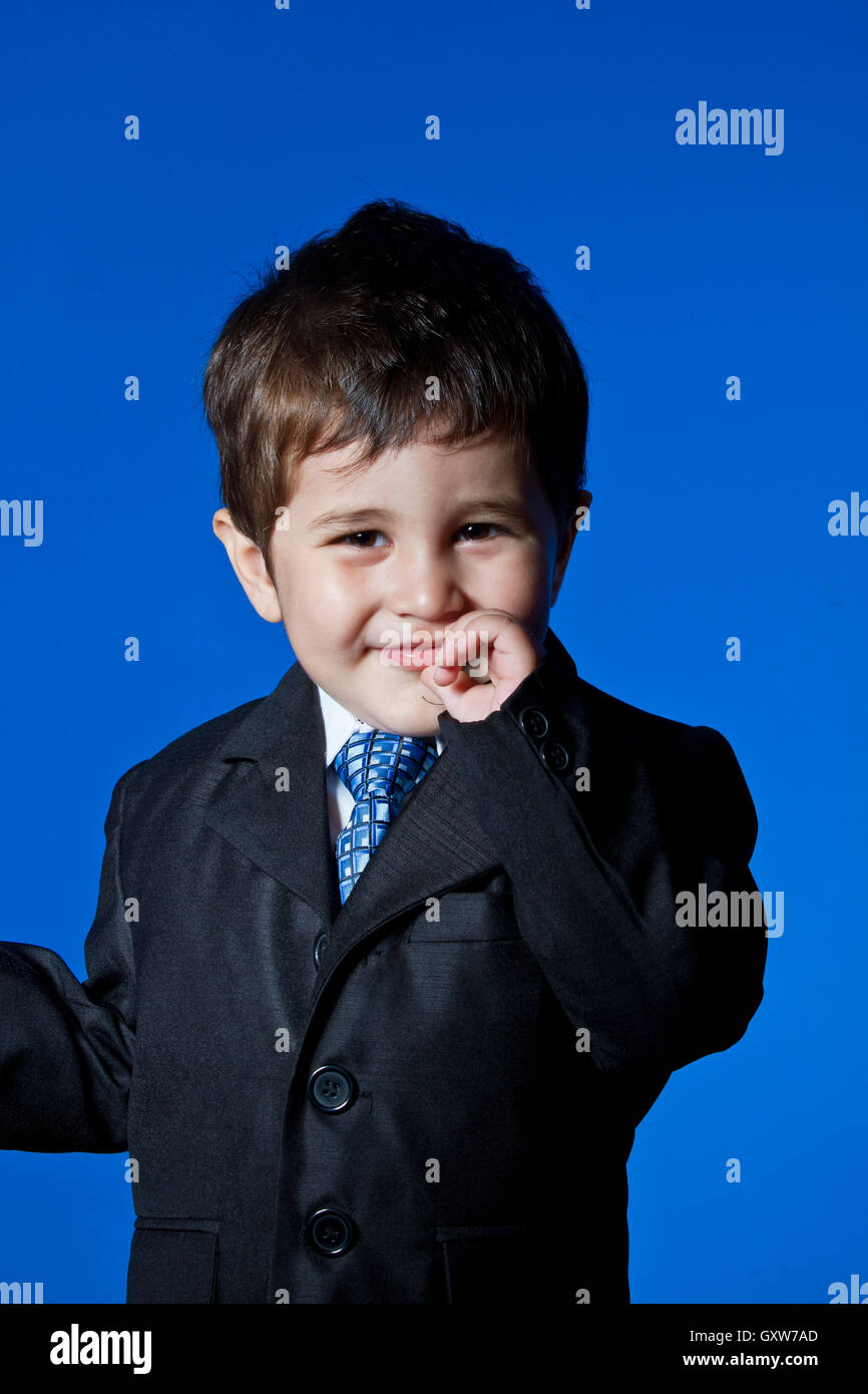 Success, Businessman surprised, cute little boy portrait over bl Stock ...