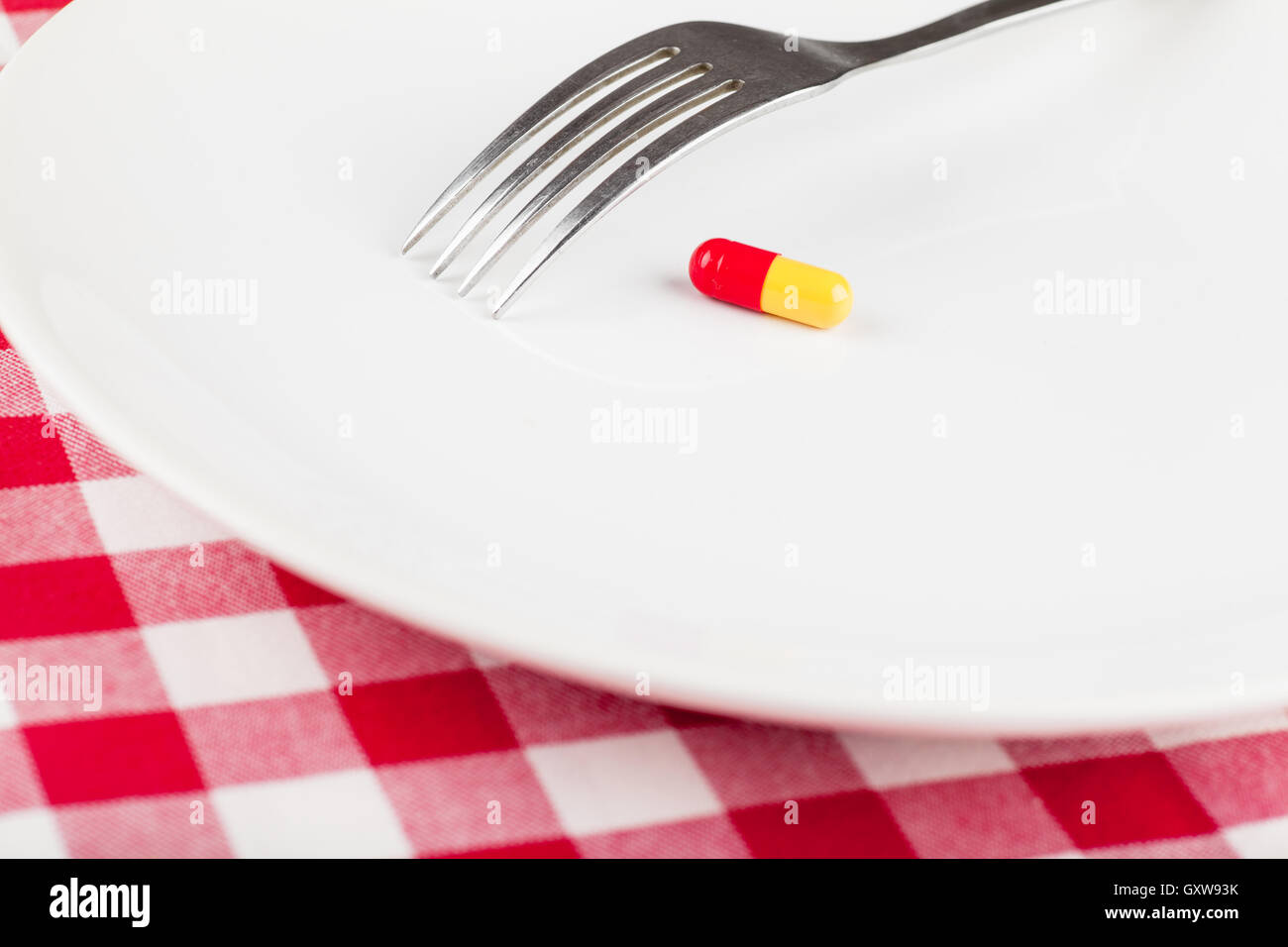 Pill on a plate Stock Photo - Alamy
