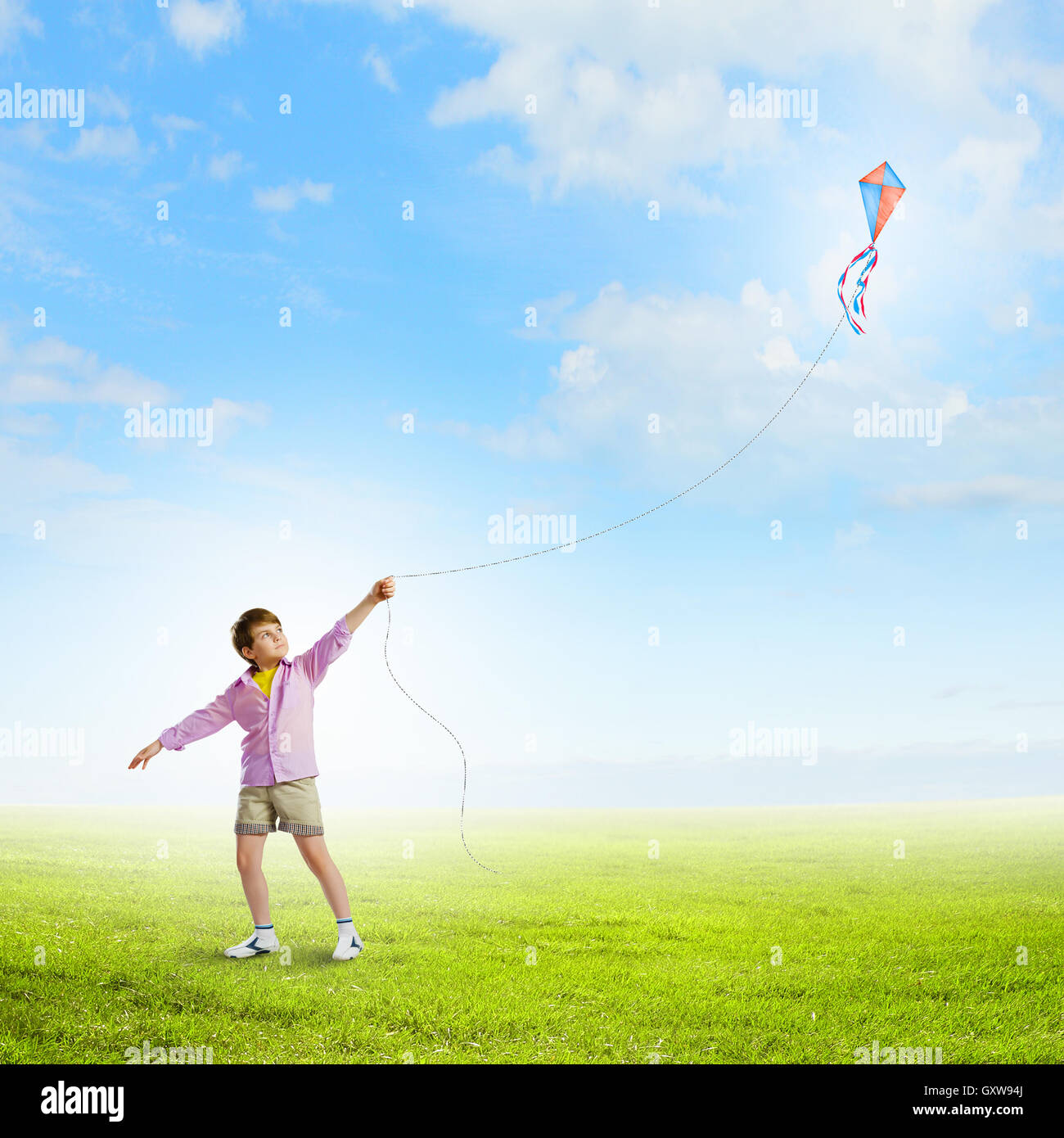 Boy with kite Stock Photo - Alamy