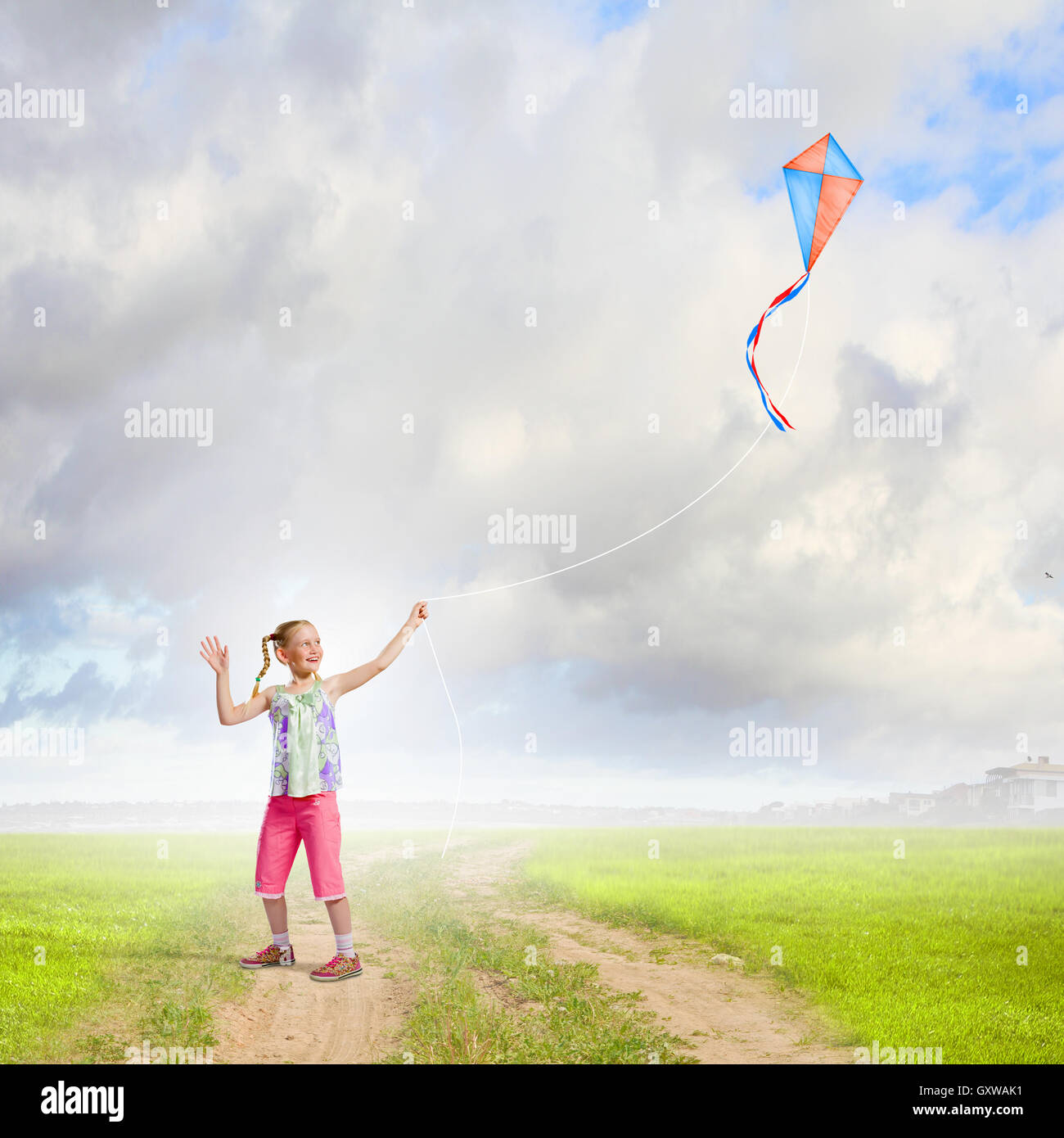 Girl with kite Stock Photo - Alamy