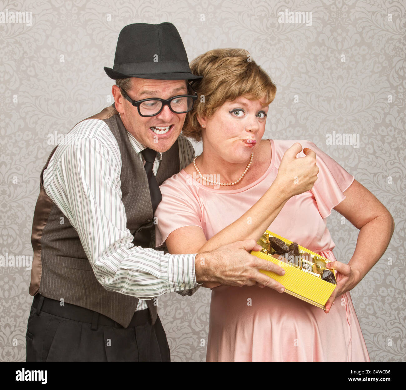 Selfish Woman with Chocolates Stock Photo - Alamy