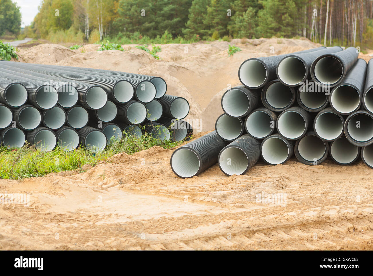 two stacks of pipes Stock Photo - Alamy