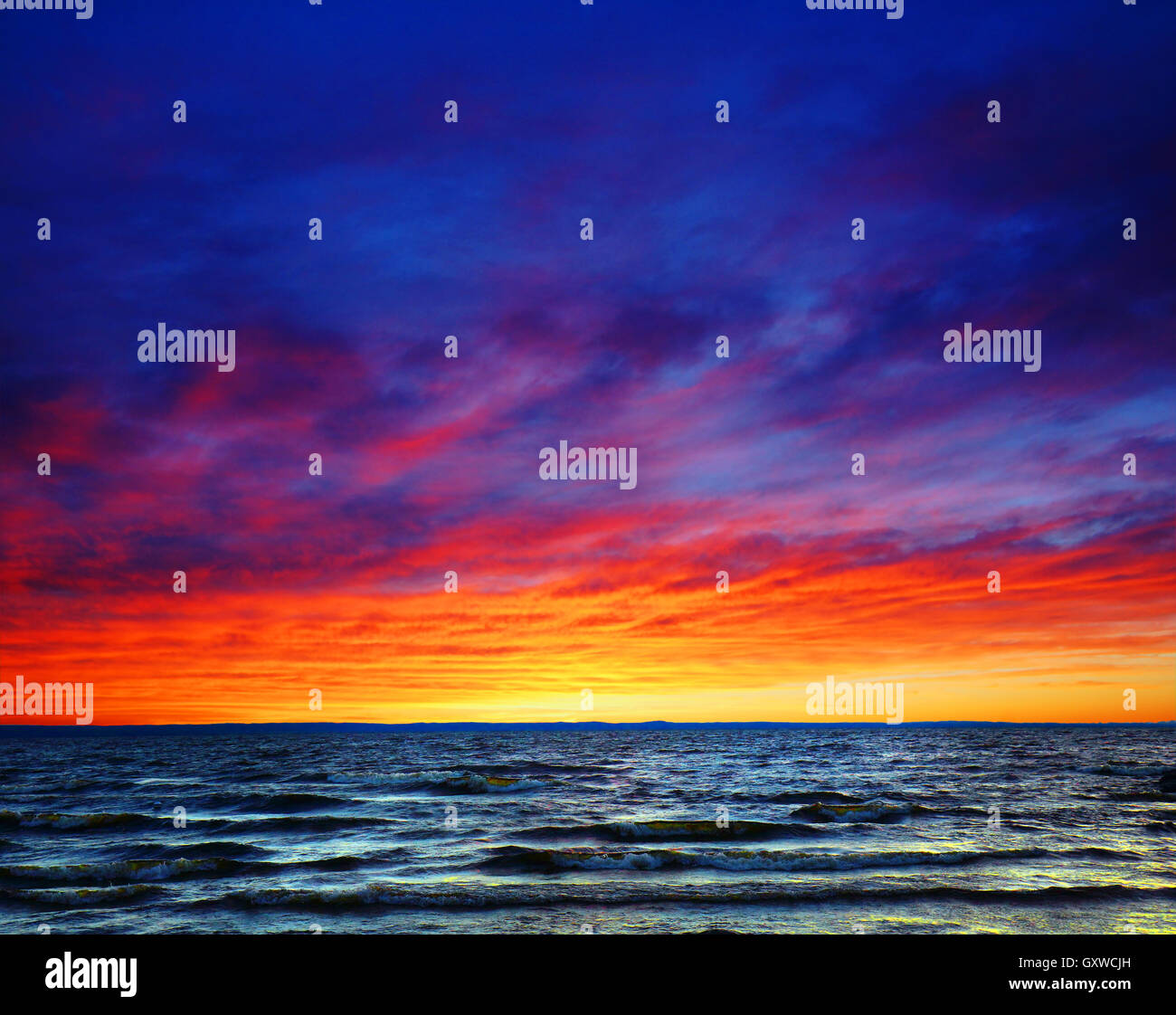 Beautiful sunset over the sea Stock Photo - Alamy