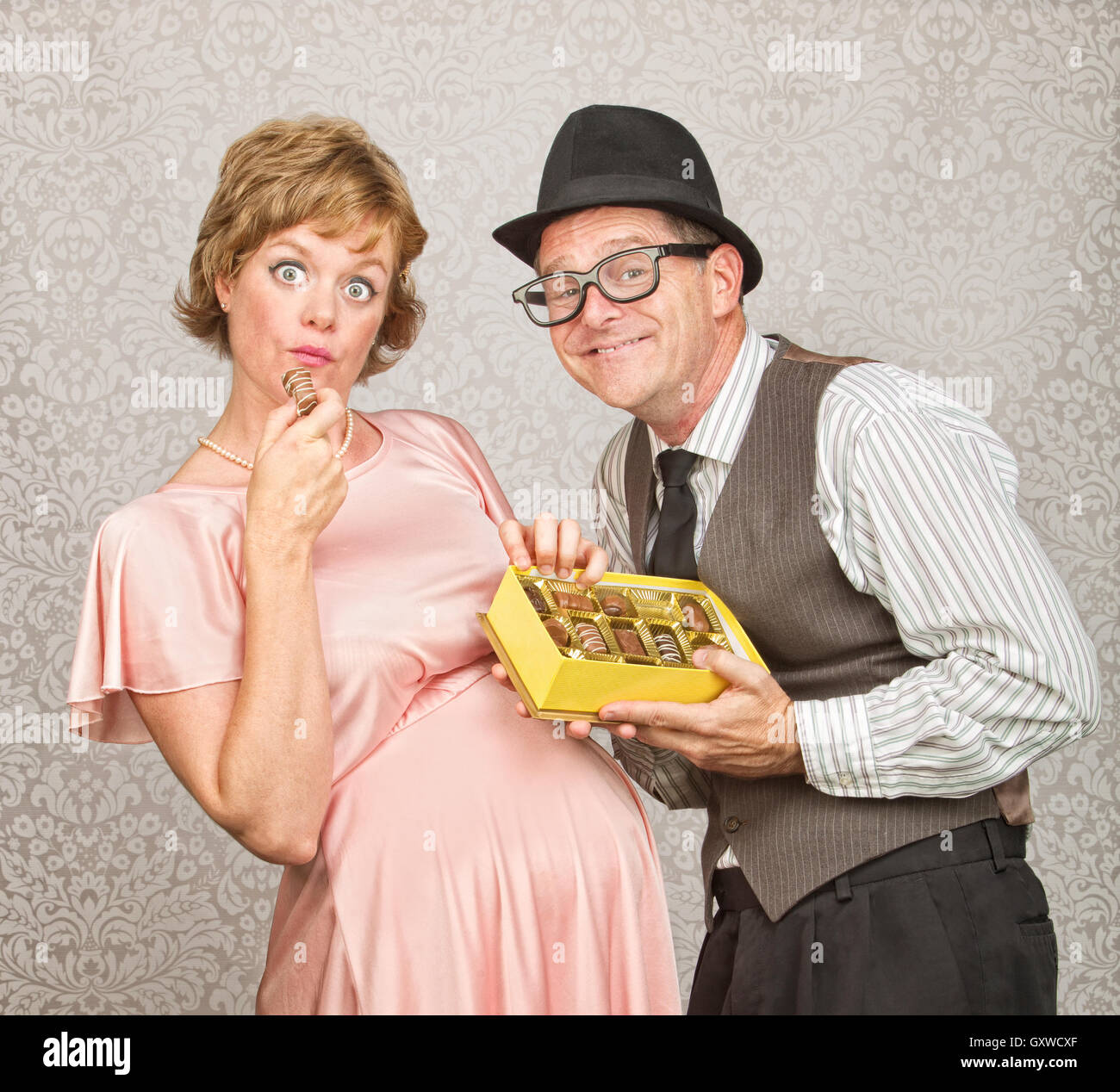 Pregnant Woman with Gift of Candy Stock Photo - Alamy