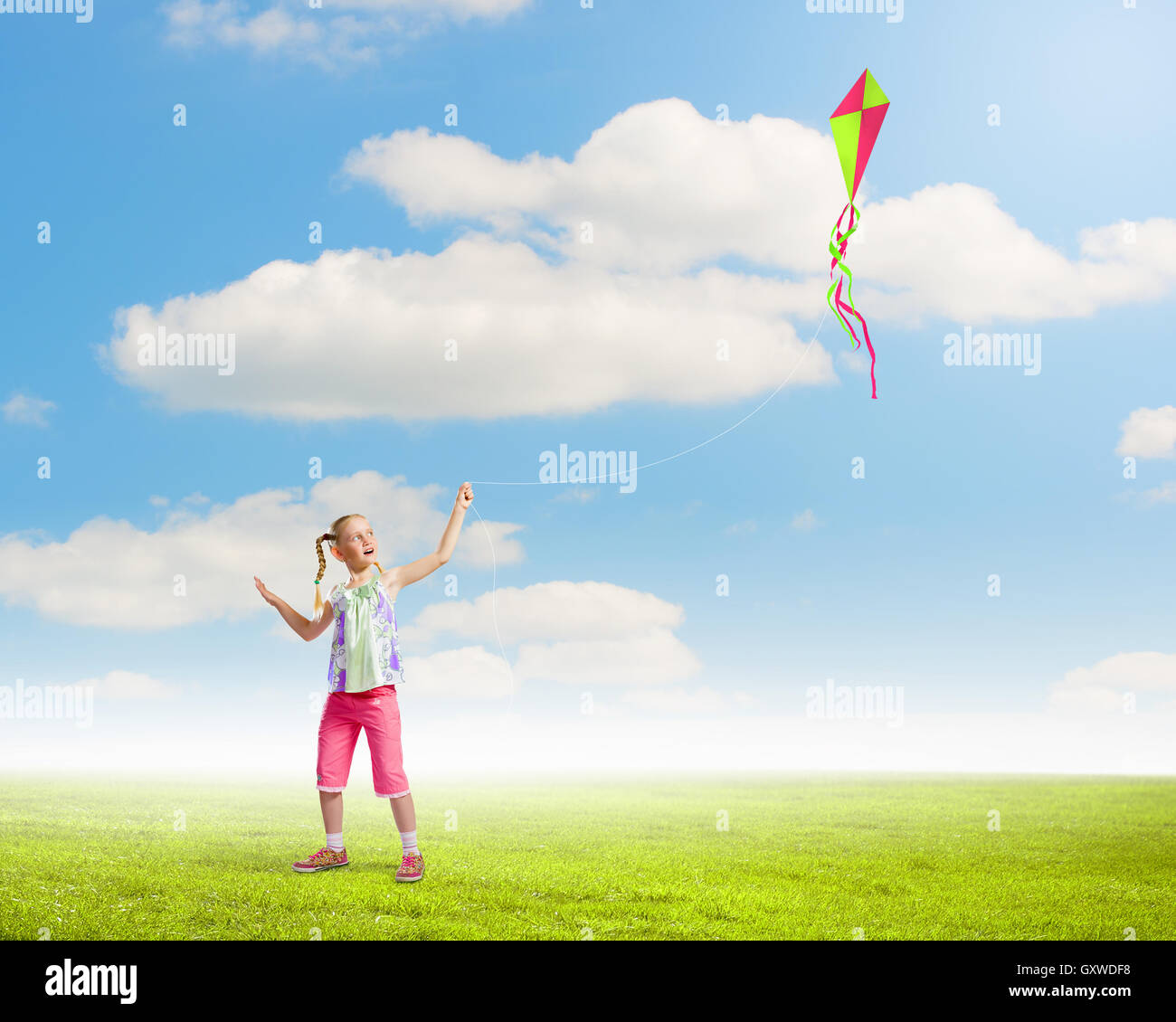 Girl with kite Stock Photo - Alamy