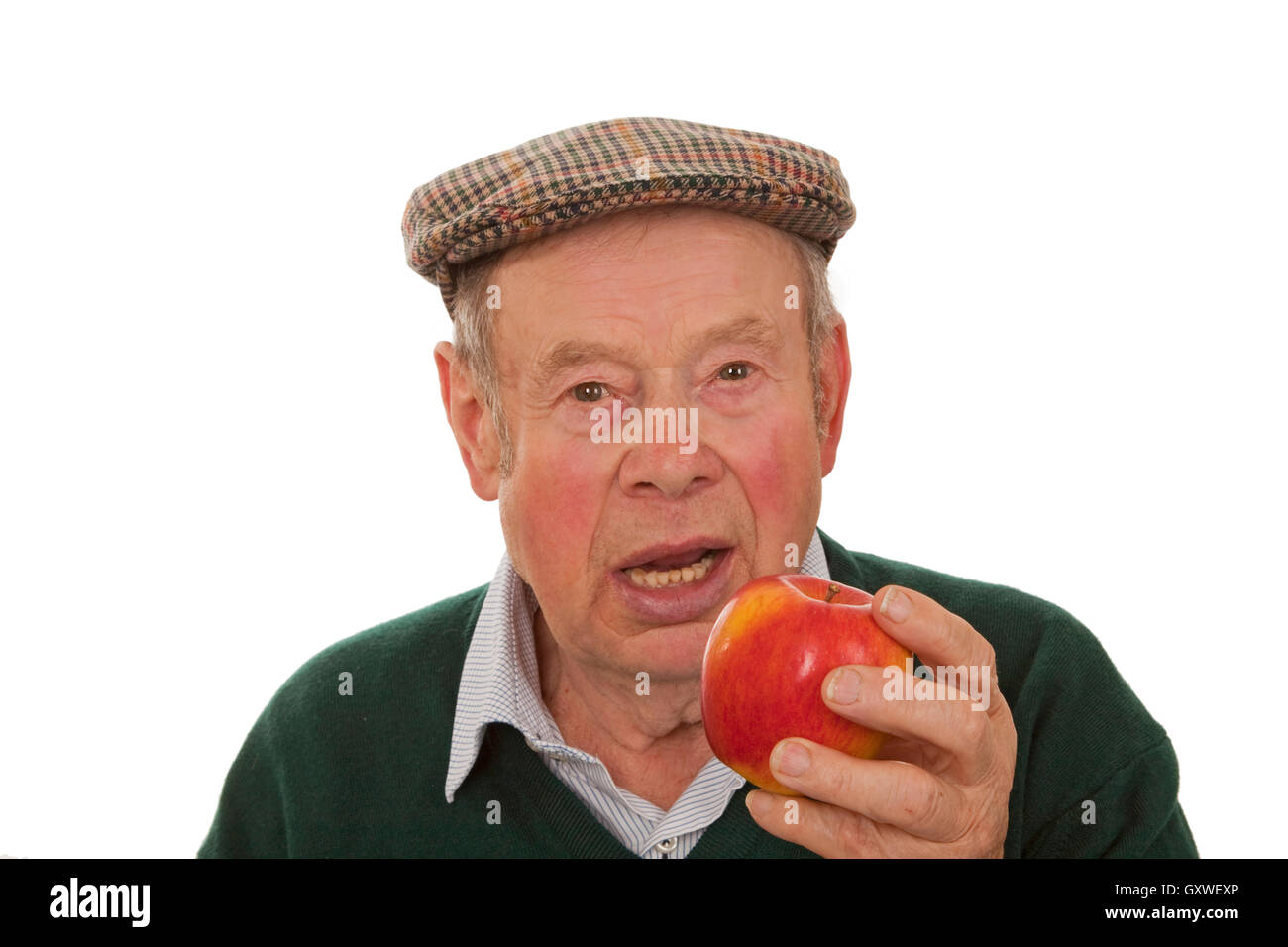 Male senior eating healthy apple isolated on white background Stock ...