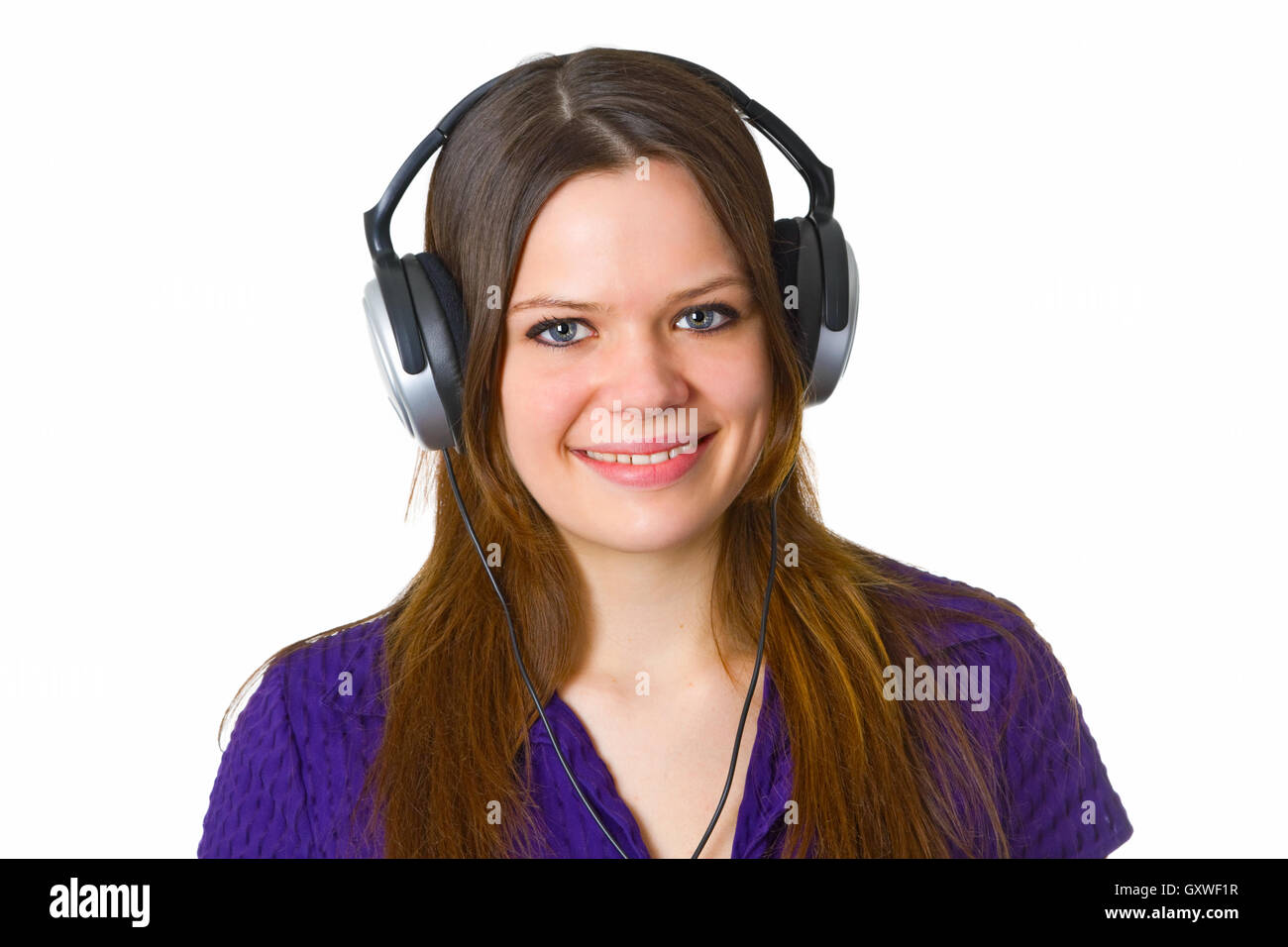 Beautiful young woman with headphones isolated on white background ...