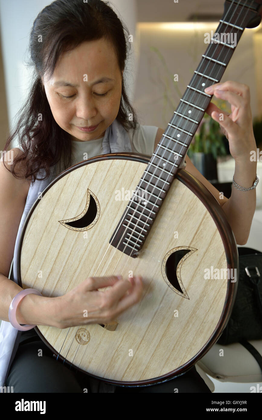 Xu Yang, Ruan performer, a professor of Central Conservatory of Music ...