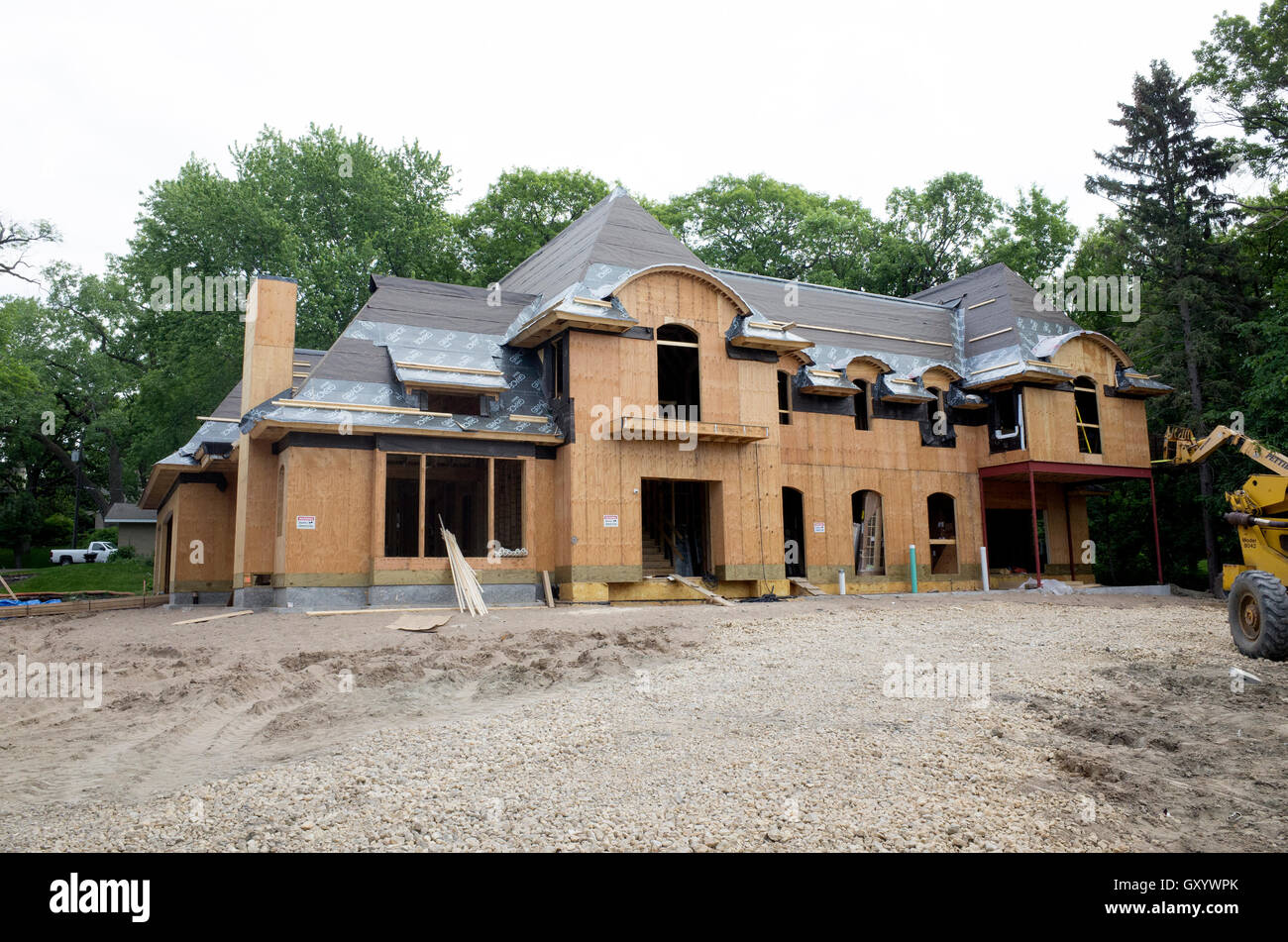 A teardown building site of a nearly completed mansion located on North ...