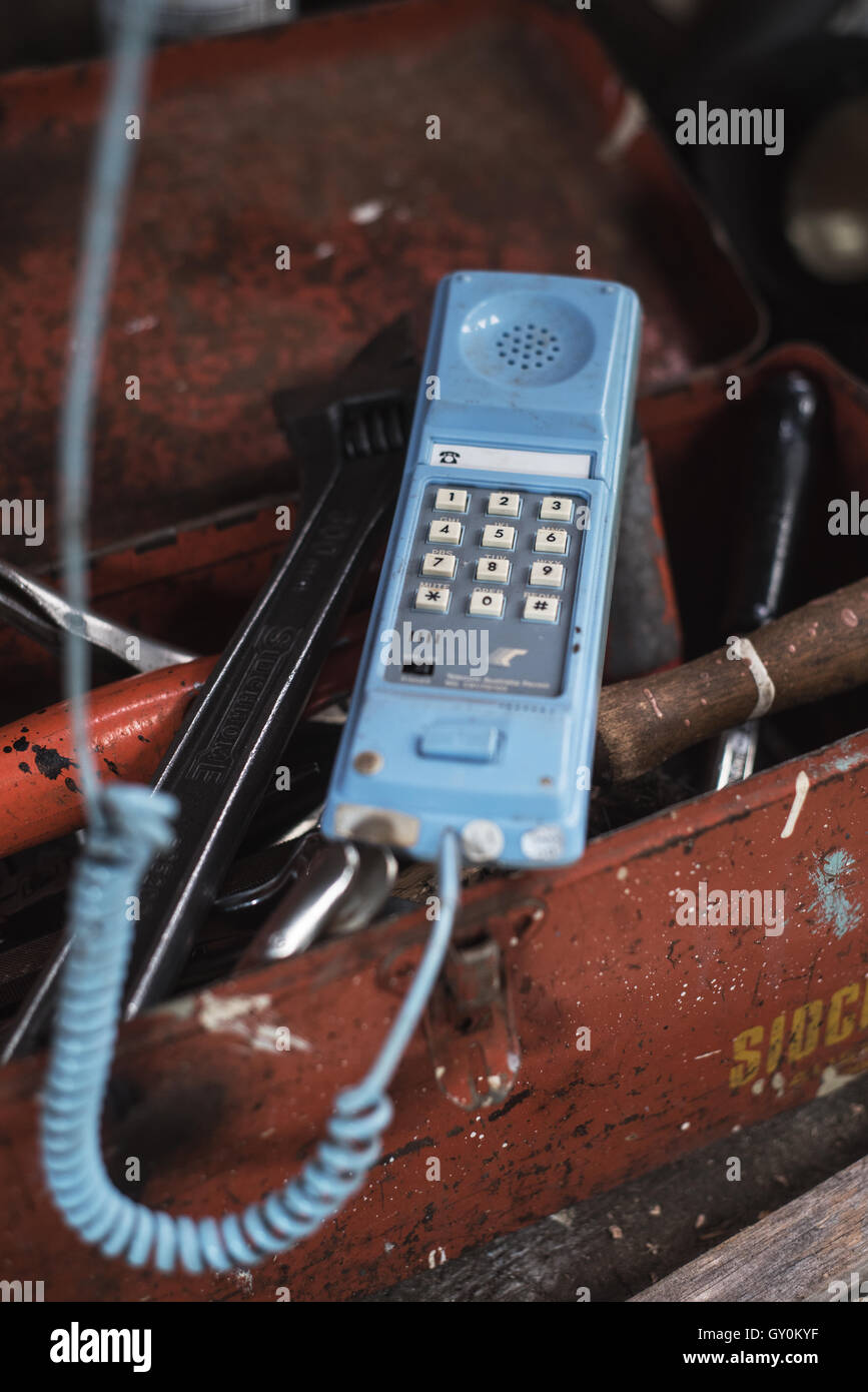 Vintage telephone in garage Stock Photo - Alamy